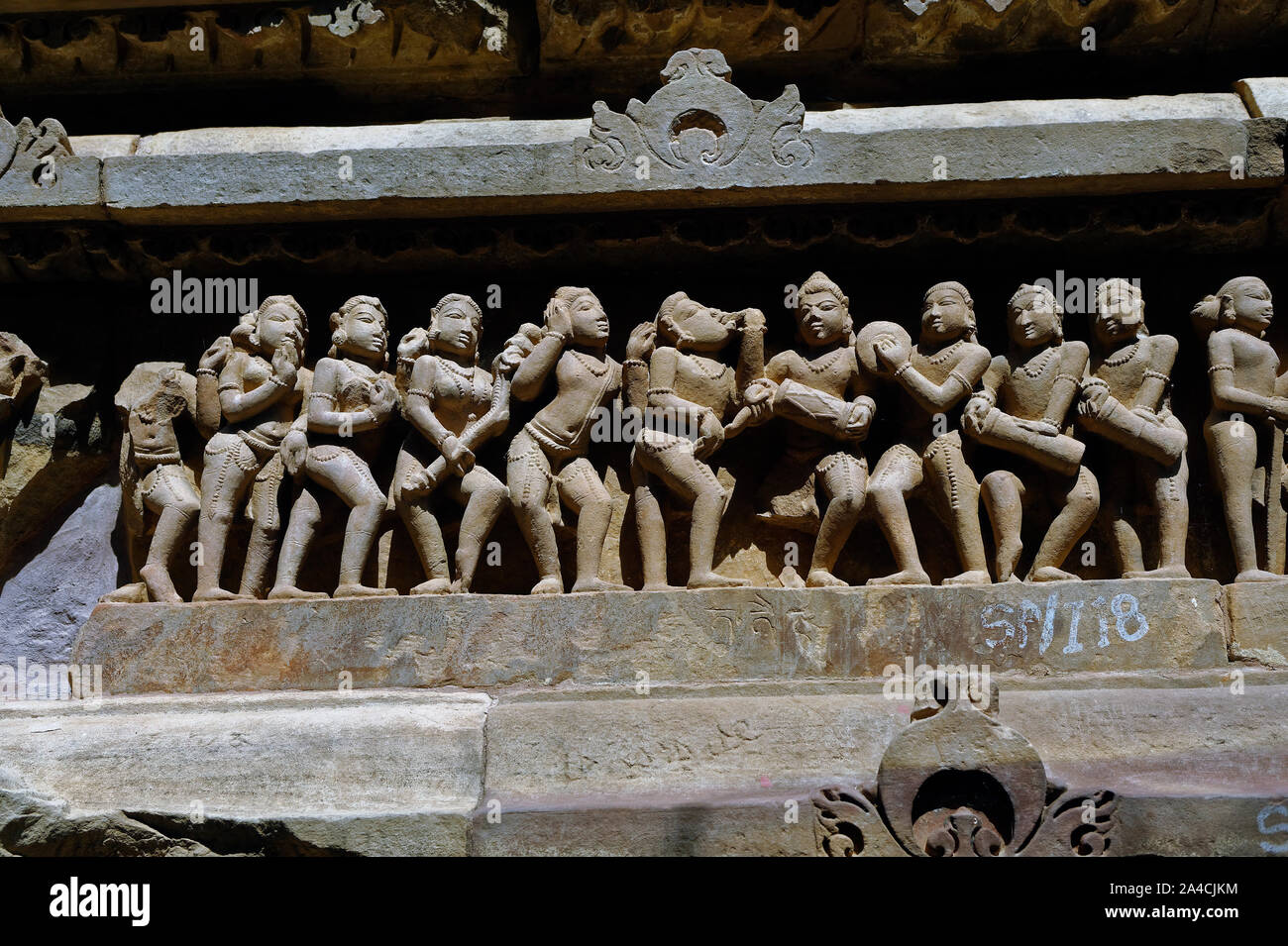 Carving of musicians and dancers Stock Photo - Alamy