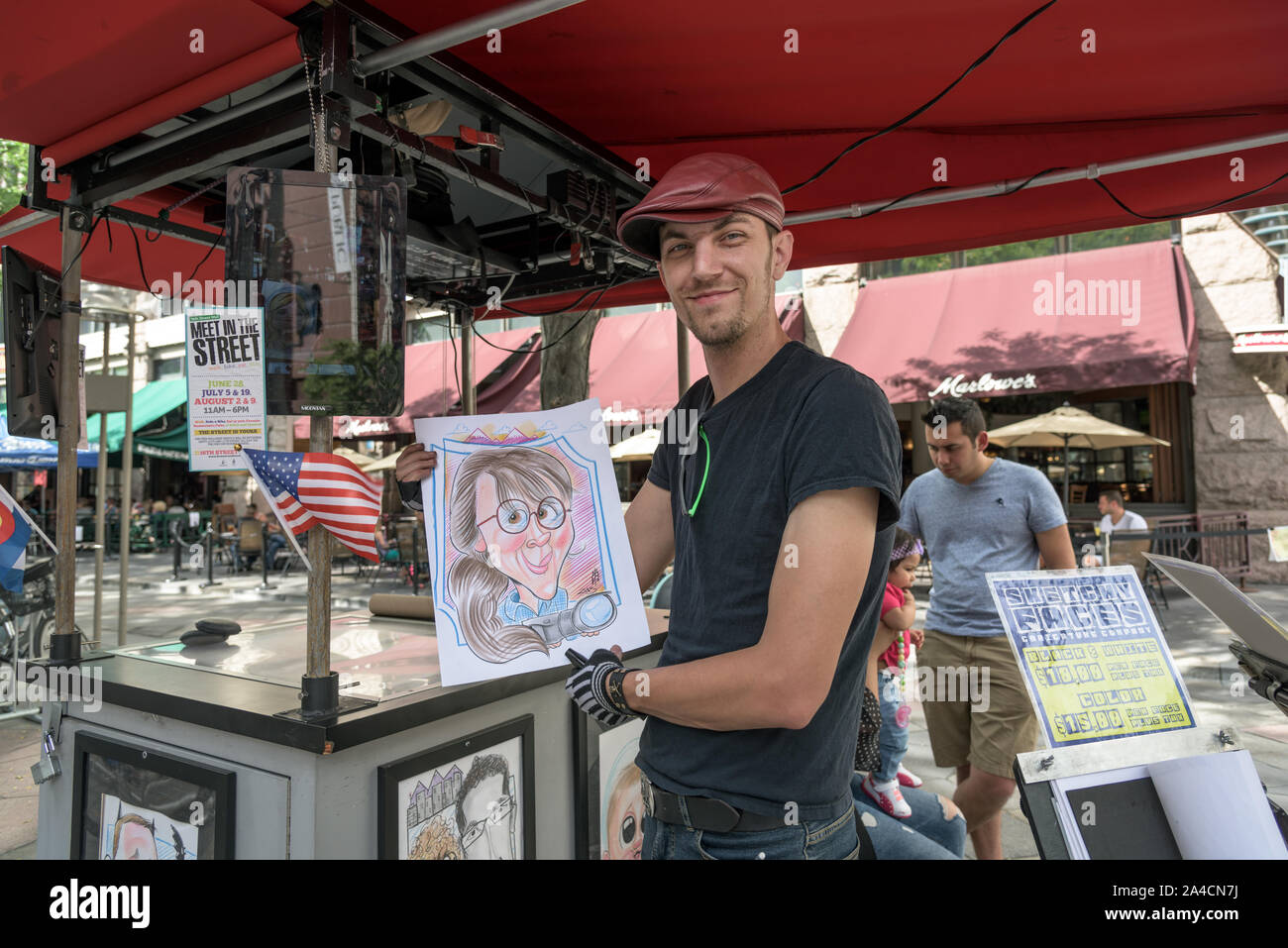The finished product: Caricaturist Ben Bloss displays his sketch of ...