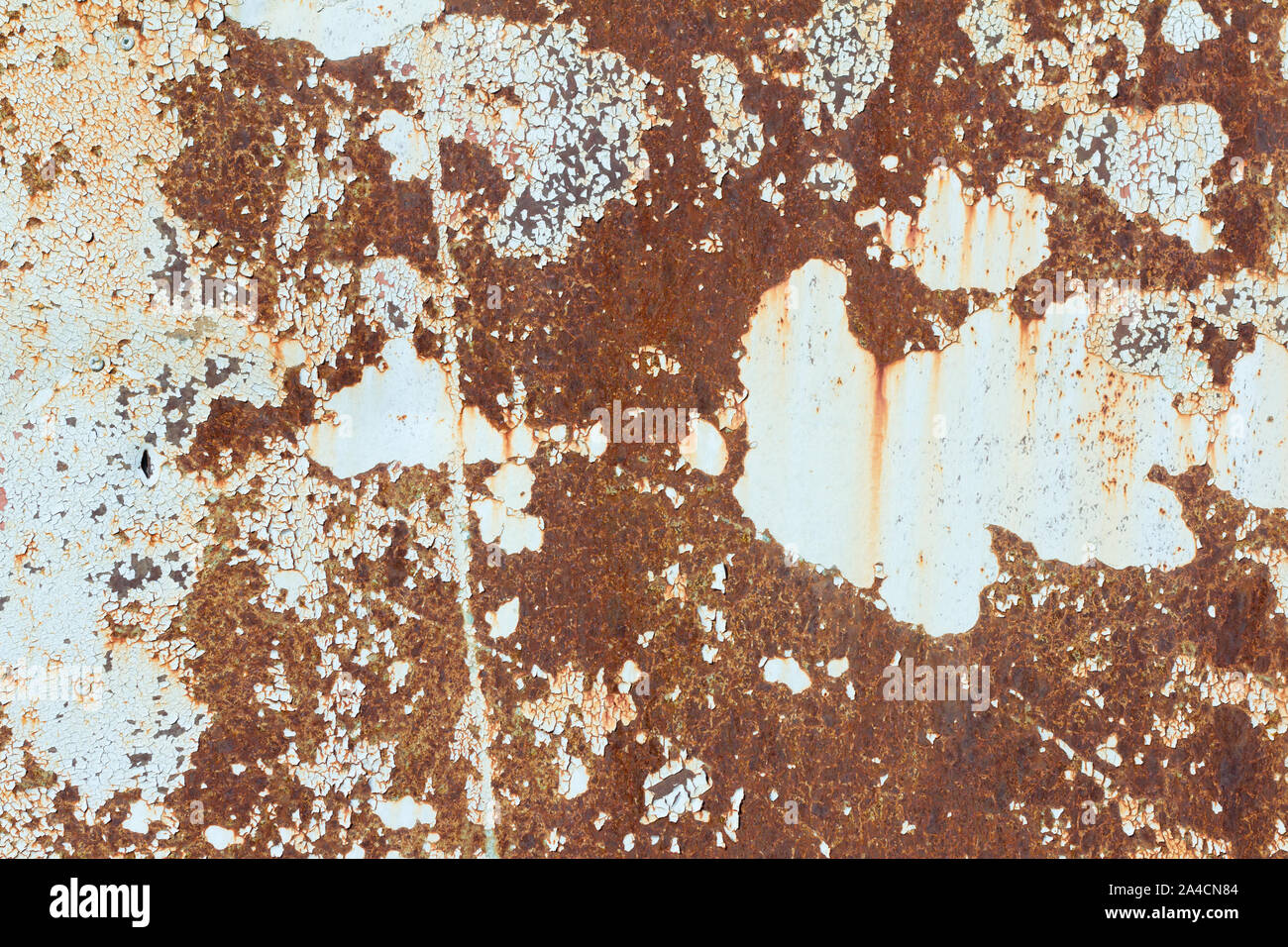 Corrosion on the white metal wall.A rusty white metal wall. Rusty metal ...