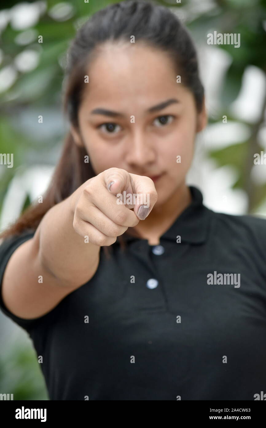 Filipina Girl Pointing Stock Photo - Alamy