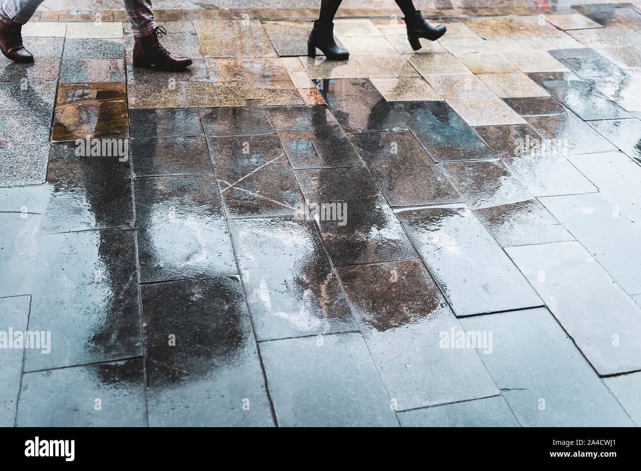 Blurry reflection legs and shadows, silhouettes of the people in the ...