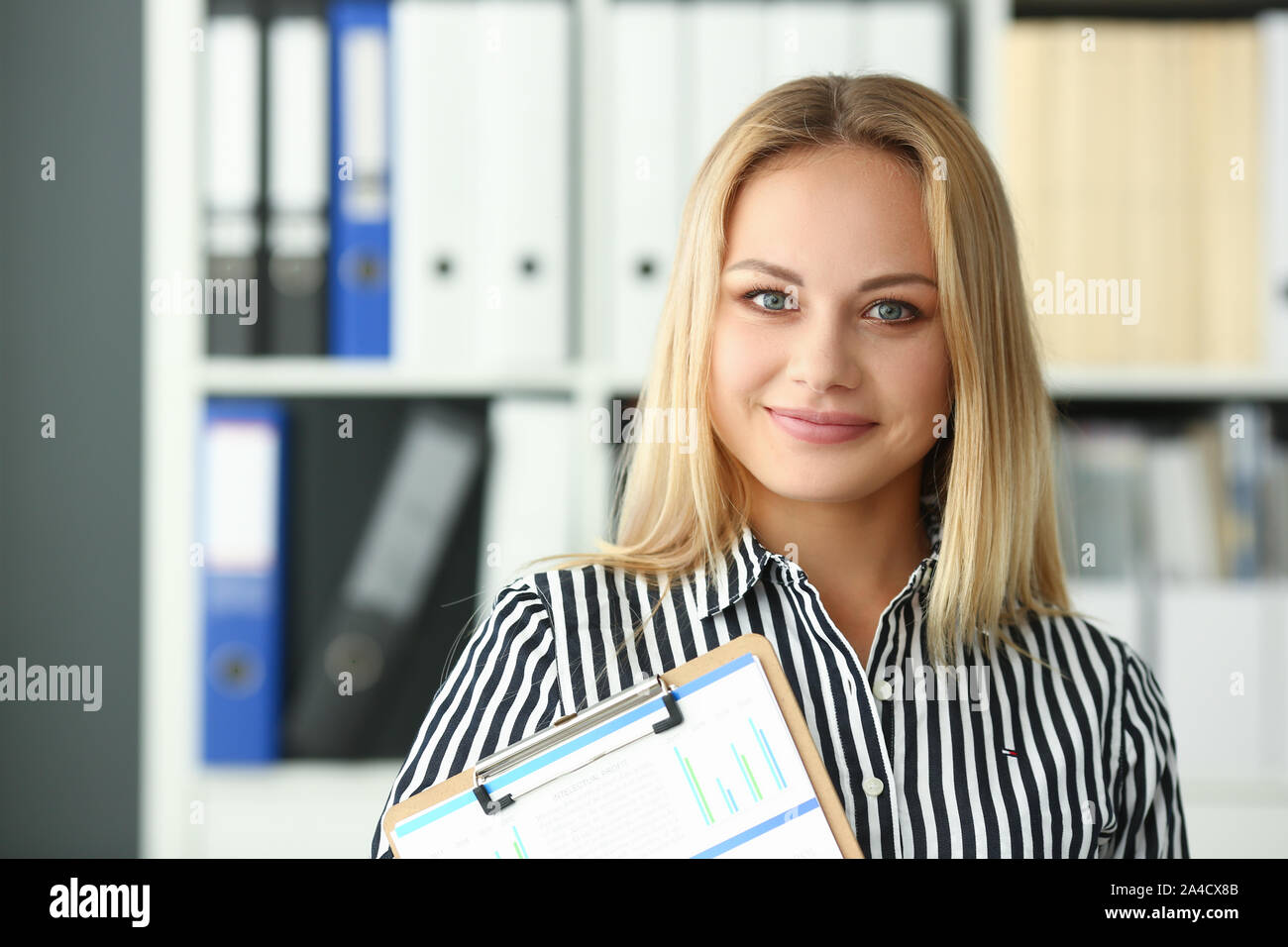 Lady in the office hi-res stock photography and images - Alamy