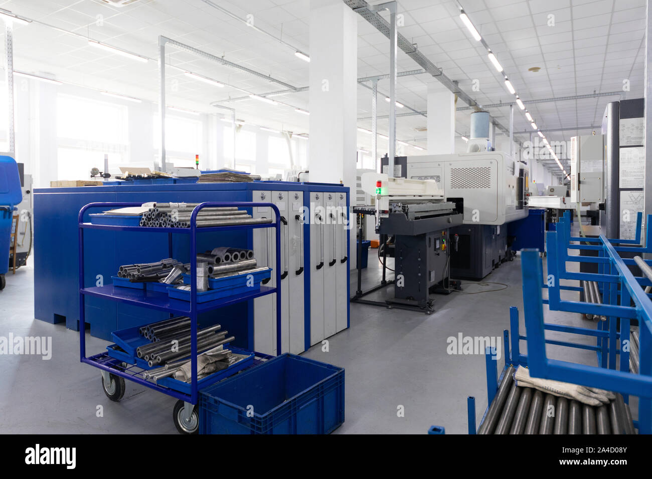 Inside of factory unit with newly processed metal parts Stock Photo - Alamy