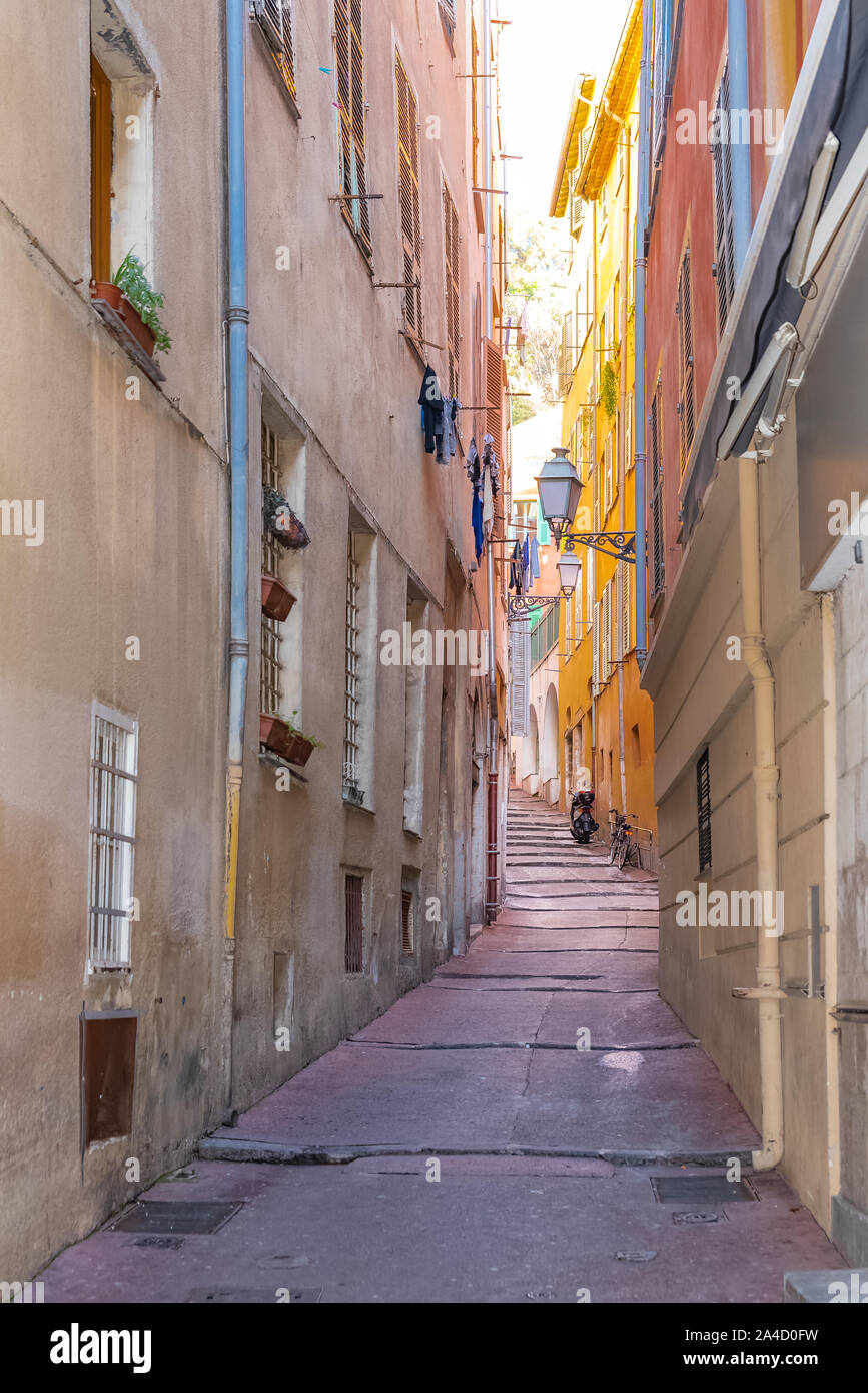 Nice, France, colorful facade, with typical windows and shutters, in a ...