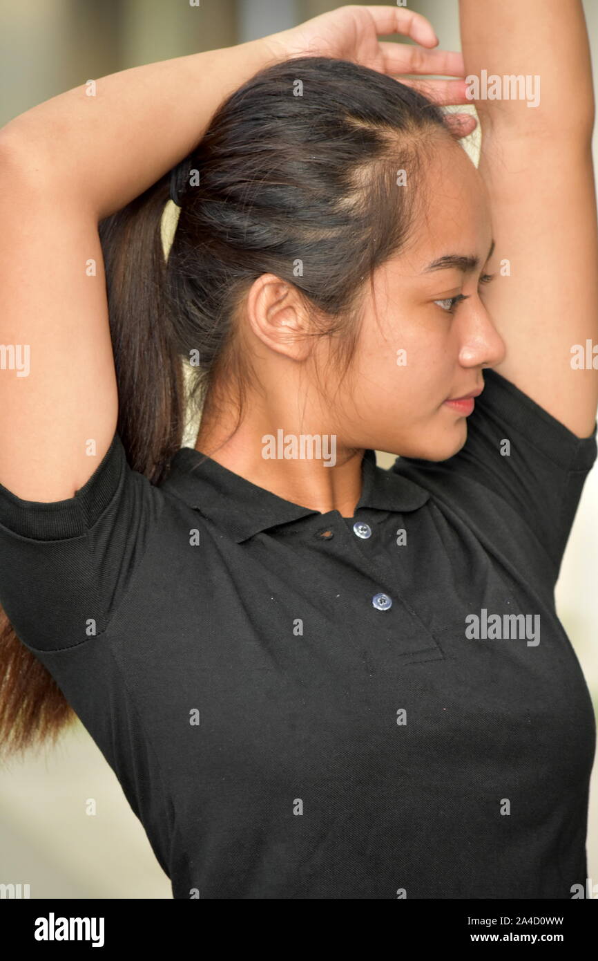 Stretching Cute Filipina Female Stock Photo - Alamy