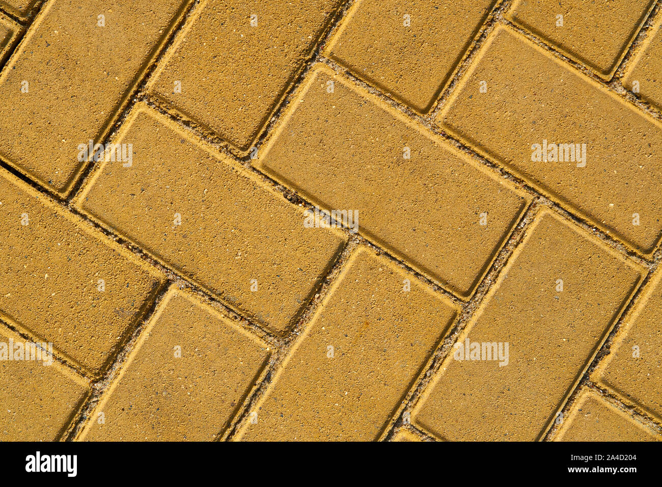 yellow paving tile for background or texture Stock Photo - Alamy