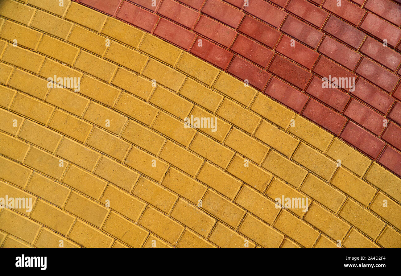 yellow and red brown paving tile for background or texture Stock Photo ...