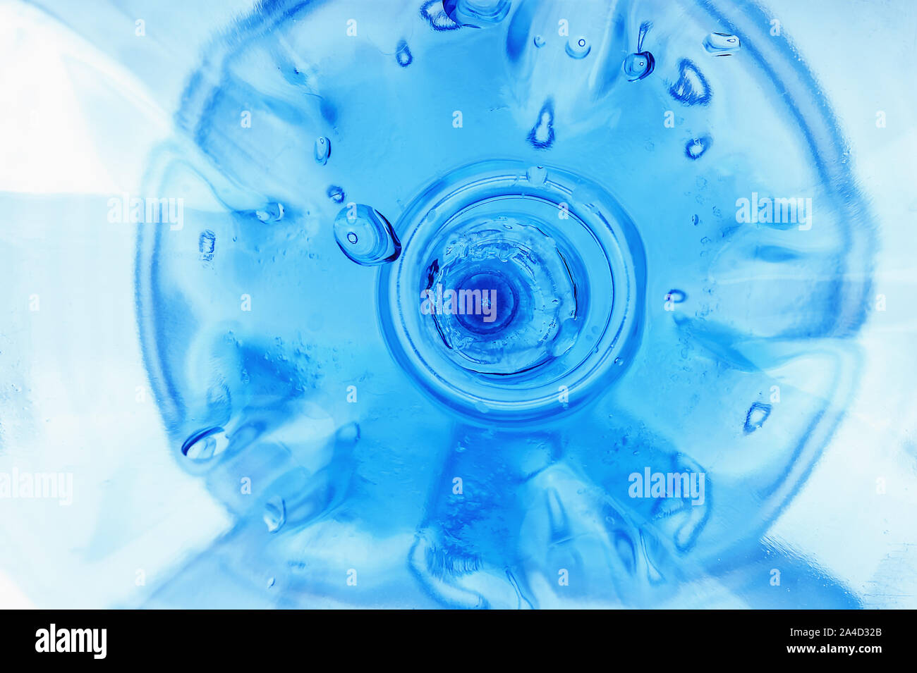 Close-up of a Plastic Bottle Bottom with Leftover Water Drops and ...