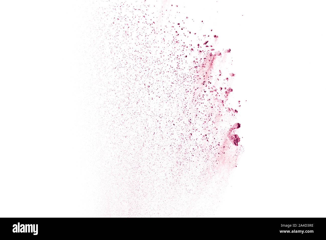 Abstract pink powder explosion on white background. Freeze motion of ...