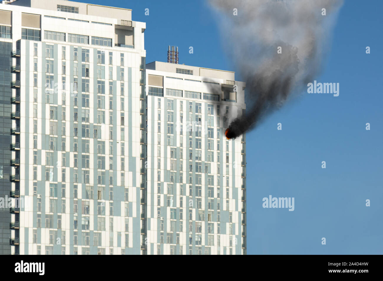 Skyscraper fire accident. Concept of firefighting problems at the ...