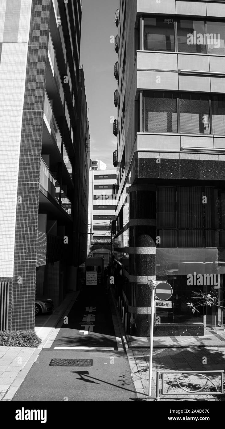 narrow street tall building urban Japan architecture black white Stock ...