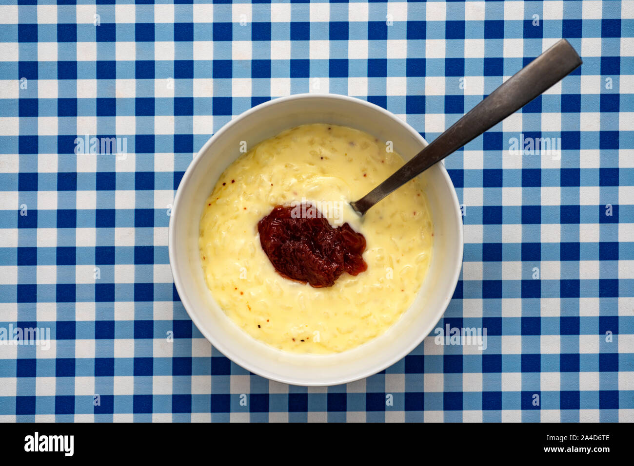 Homemade rice pudding with nutmeg and raspberry jam Stock Photo - Alamy
