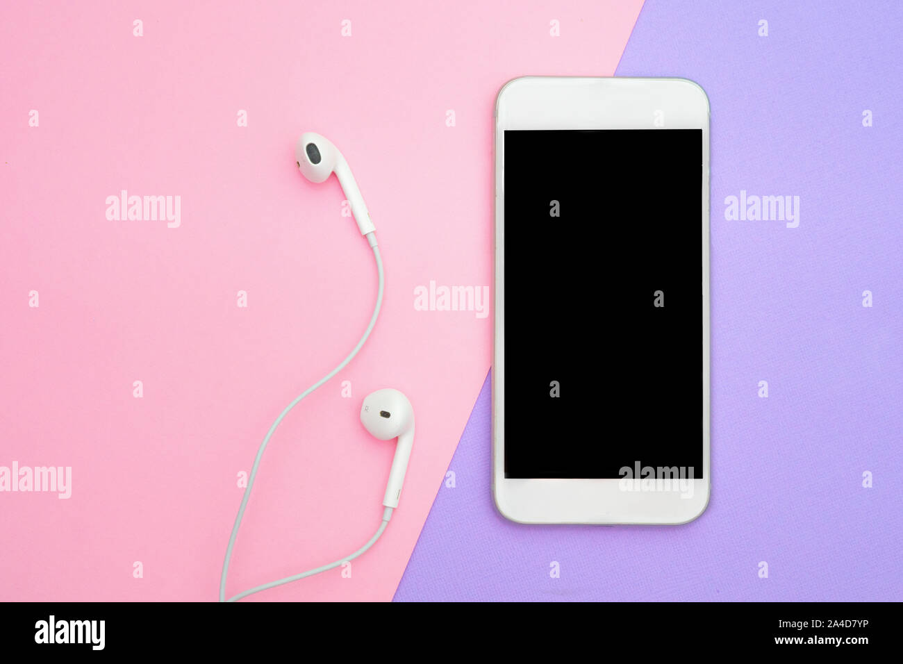 Music, gadgets, music lover. White smartphone on the purple and blue ...