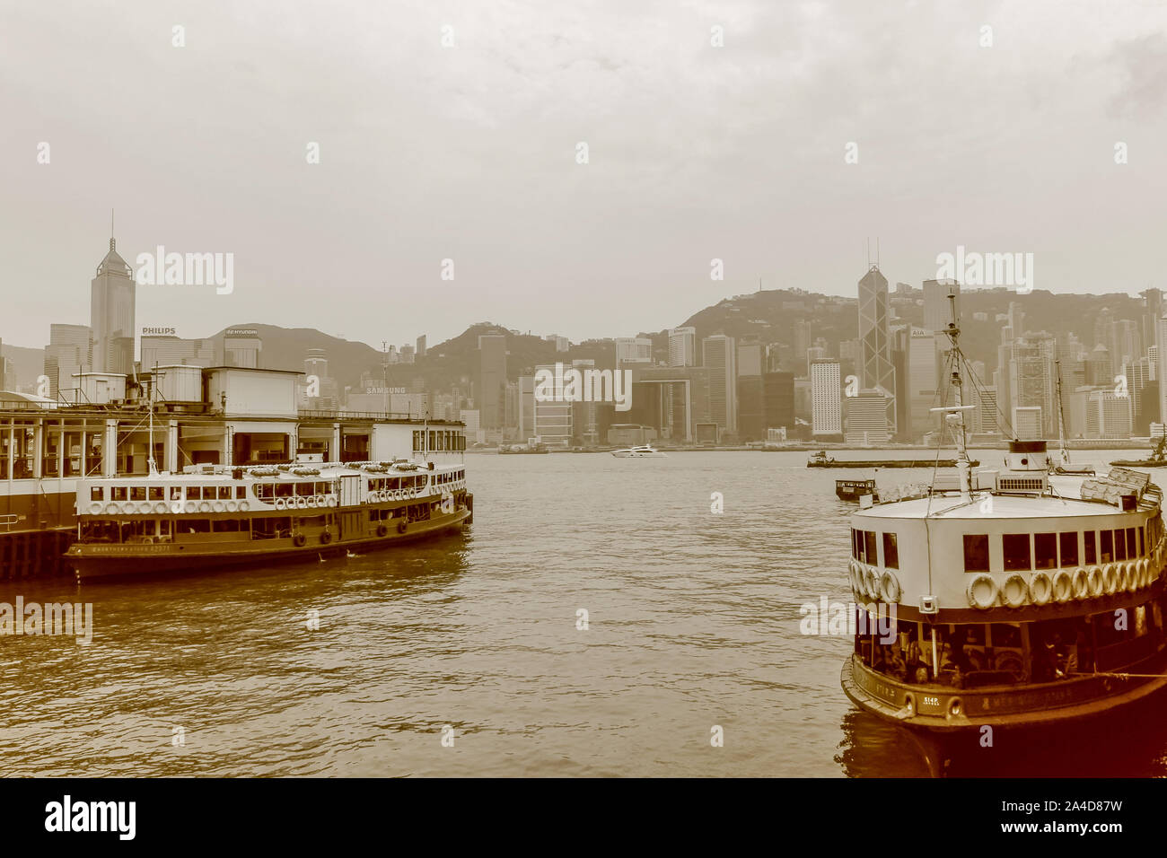 Traditional Star Ferry and Tsim Sha Tsui Star Ferry Pier. Victoria Bay ...