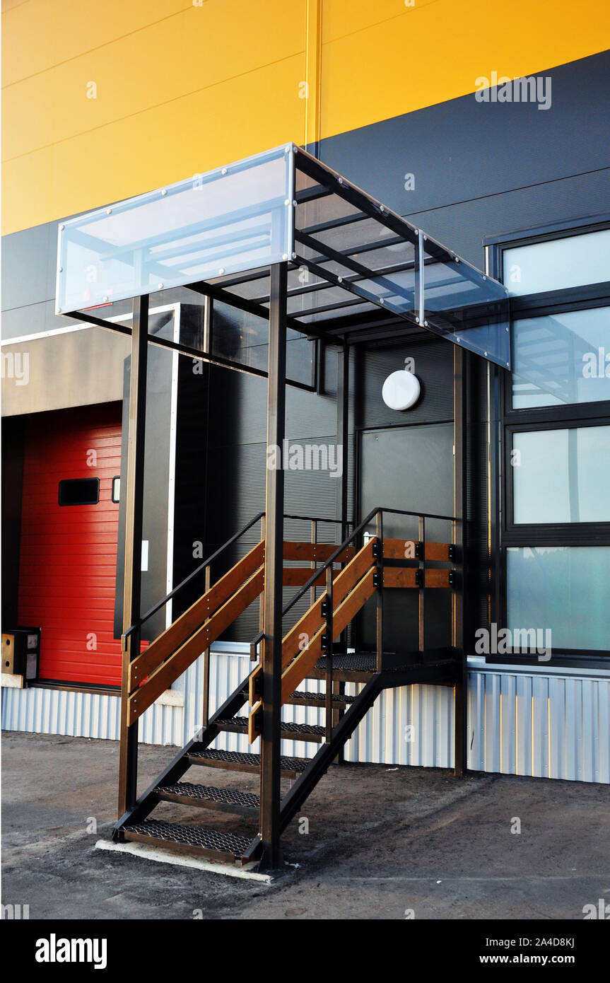 Metal stairs and porch at the entrance to the office premises of an ...