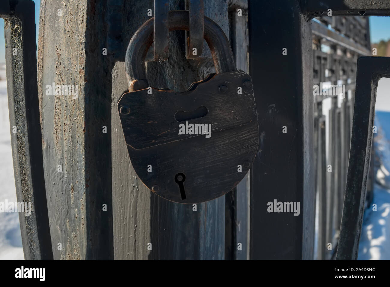 Gate locked on padlock Stock Photo - Alamy