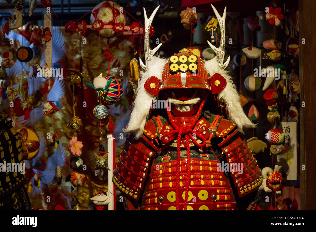 Red samurai armour on display in a shop in Bessho Onsen, Ueda, Nagano ...