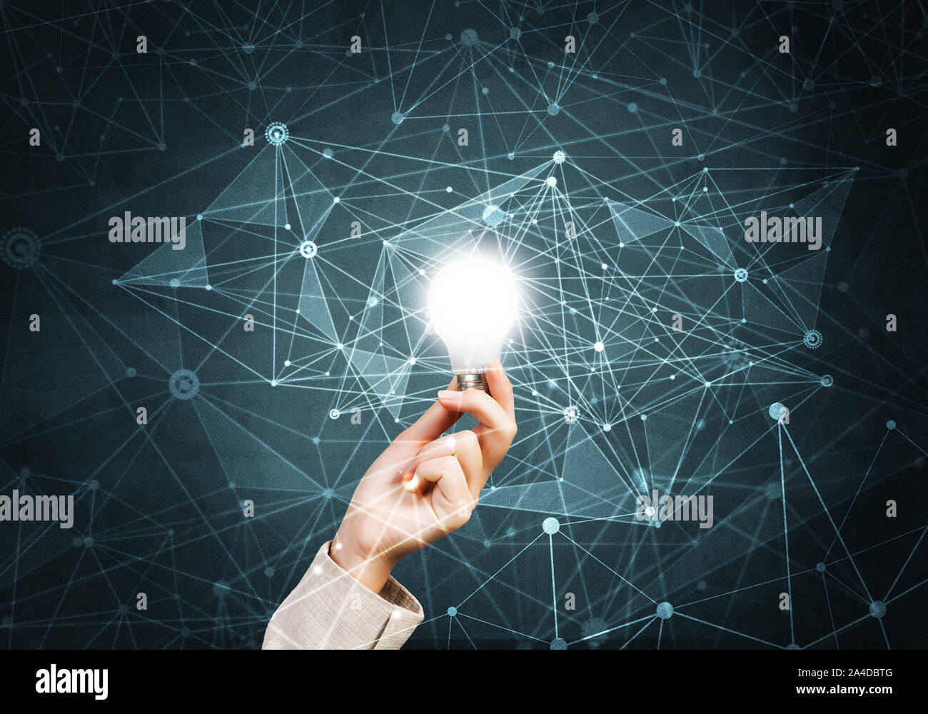 Woman hand holding light bulb and abstract network Stock Photo - Alamy