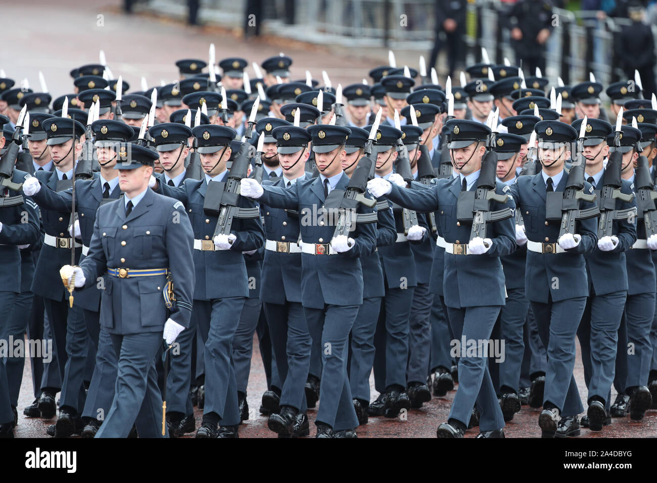 The Queen's Colour Squadron of the Royal Air Force march to line the ...