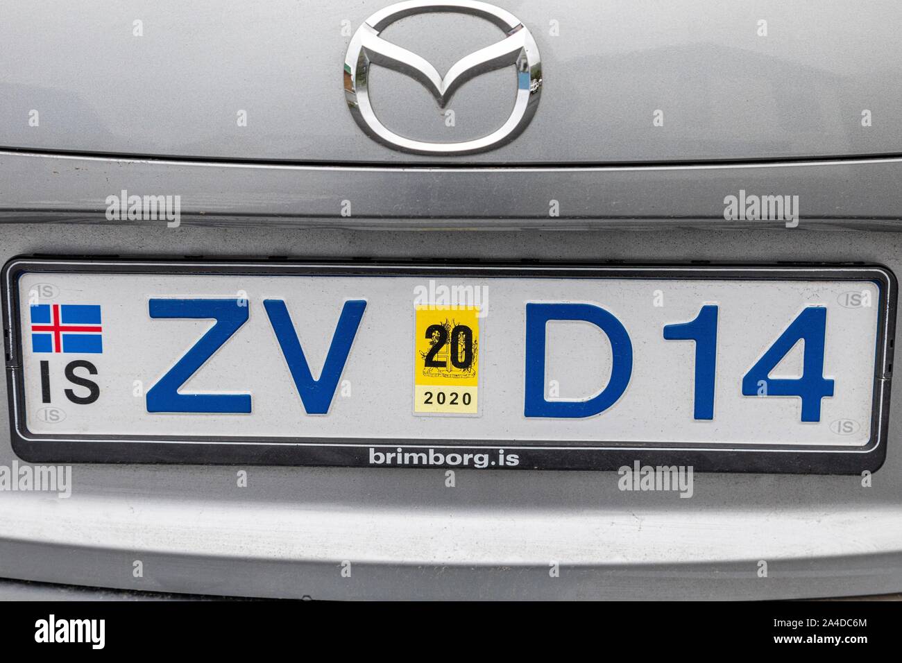 ICELANDIC LICENSE PLATE, BLUE ON A WHITE BACKGROUND, WITH THE DATE OF ...