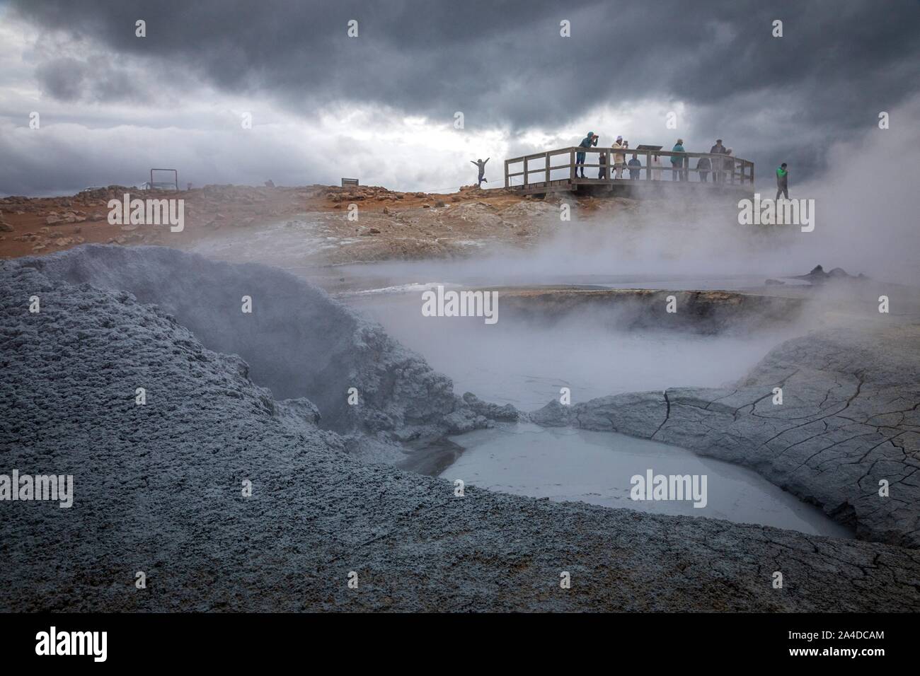 PONDS OF BOILING GRAY MUD AND FUMAROLES GIVING OFF SULFURIC GAS ...