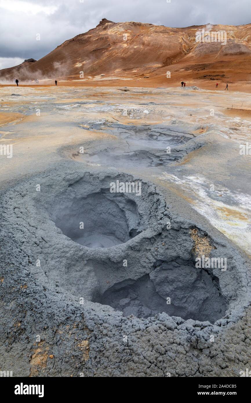 PONDS OF BOILING GRAY MUD AND FUMAROLES GIVING OFF SULFURIC GAS ...