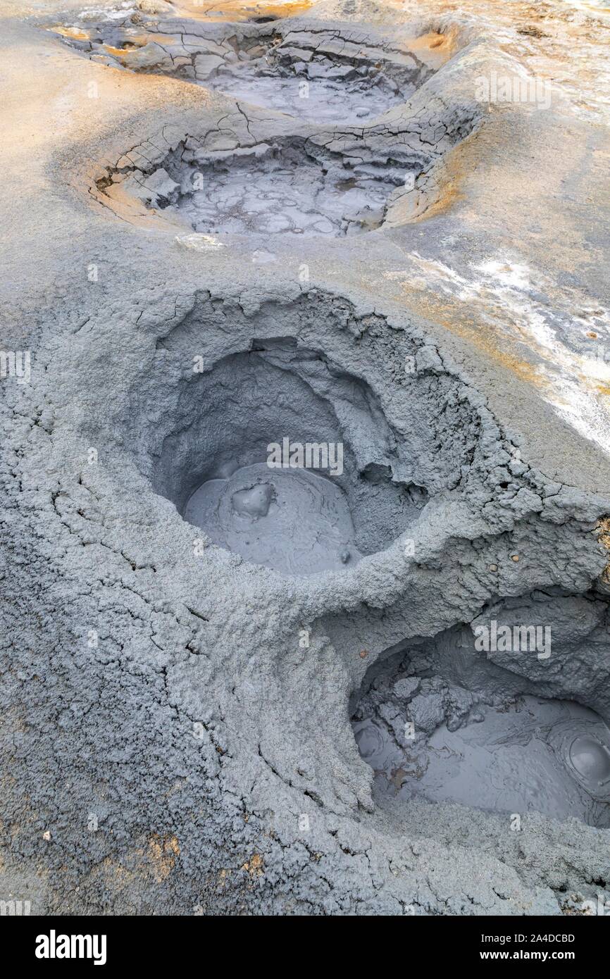 PONDS OF BOILING GRAY MUD AND FUMAROLES GIVING OFF SULFURIC GAS ...