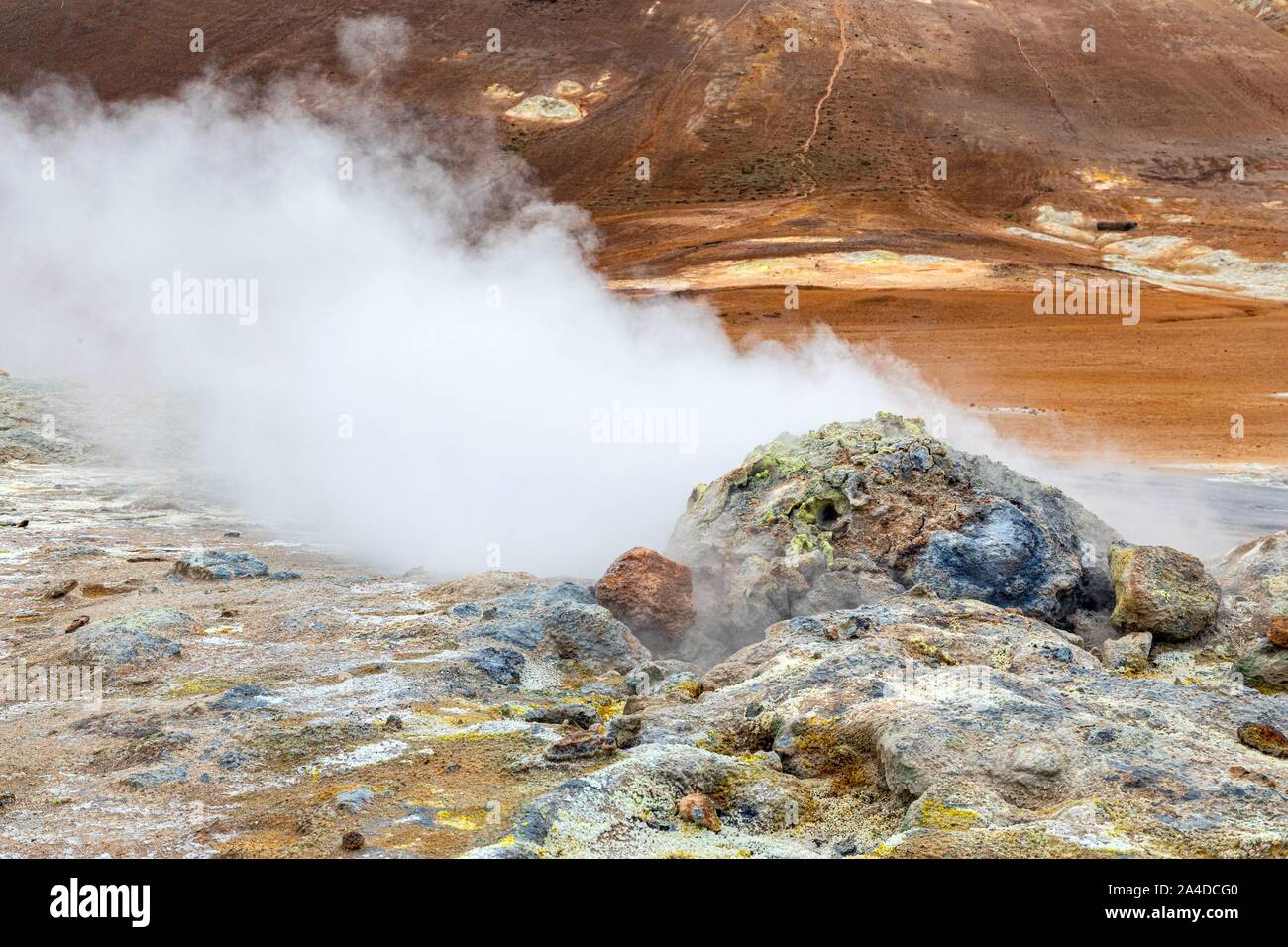 PONDS OF BOILING GRAY MUD AND FUMAROLES GIVING OFF SULFURIC GAS ...