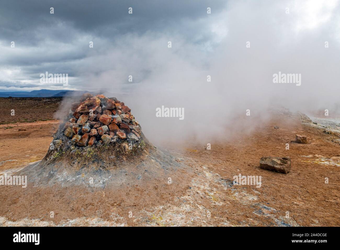 SULFURIC SMOKE, MOUND OF HOT STONES GIVING OFF SULFURIC GAS, GEOTHERMAL ...