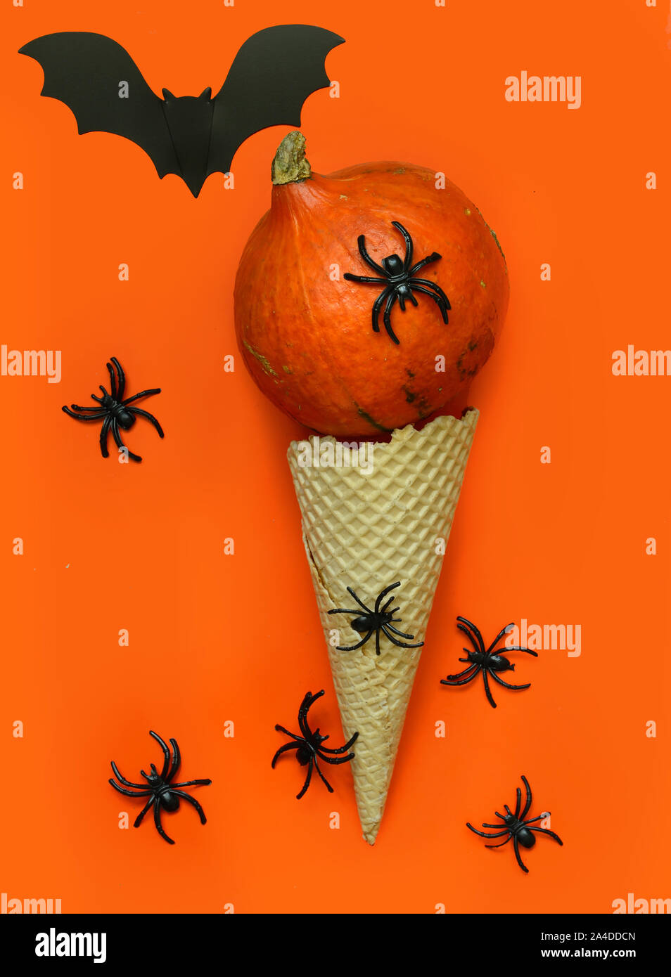 ice cream cone with pumpkin and spiders Stock Photo - Alamy