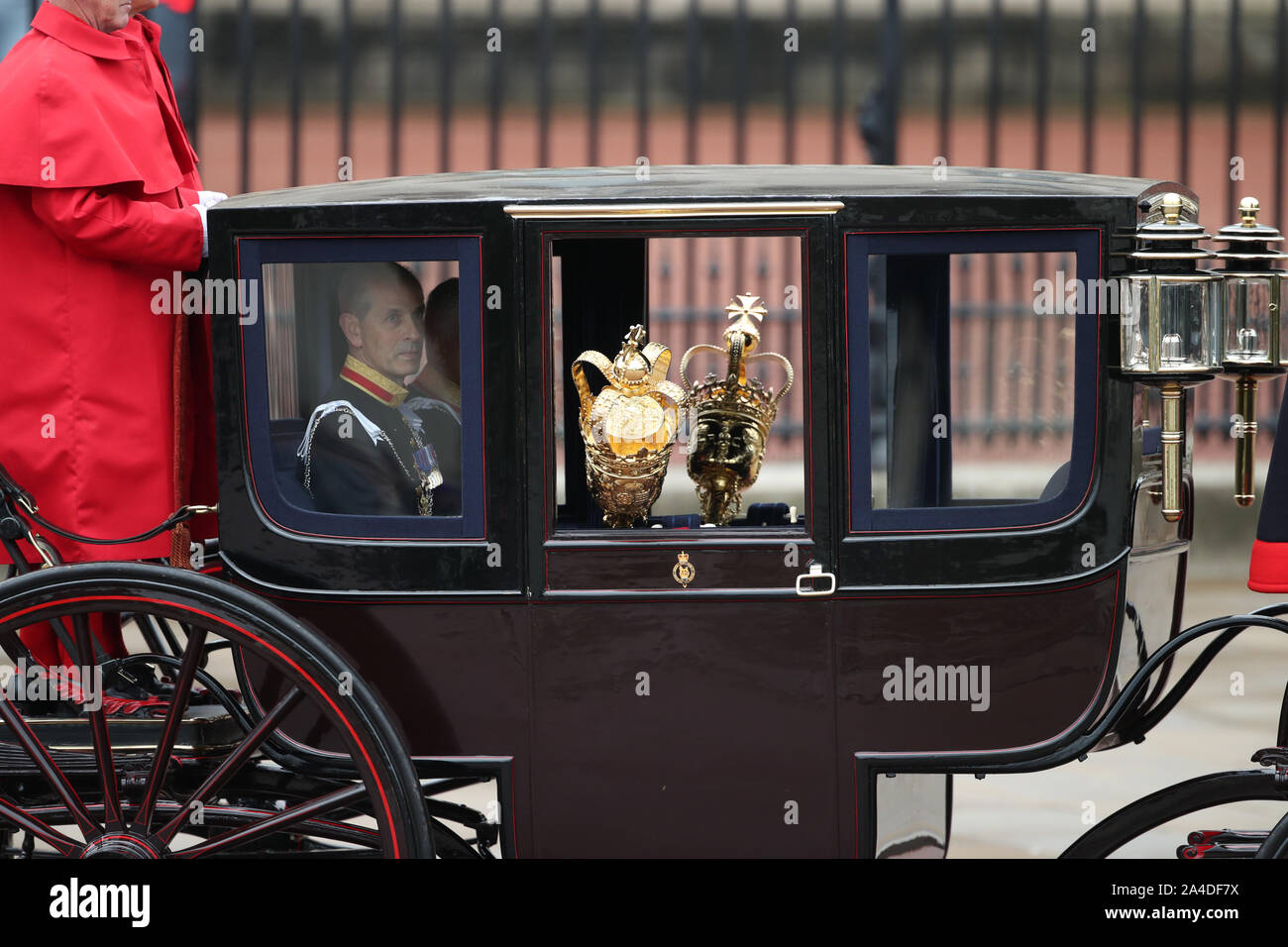 The ceremonial maces protruding from a State carriage window as they ...
