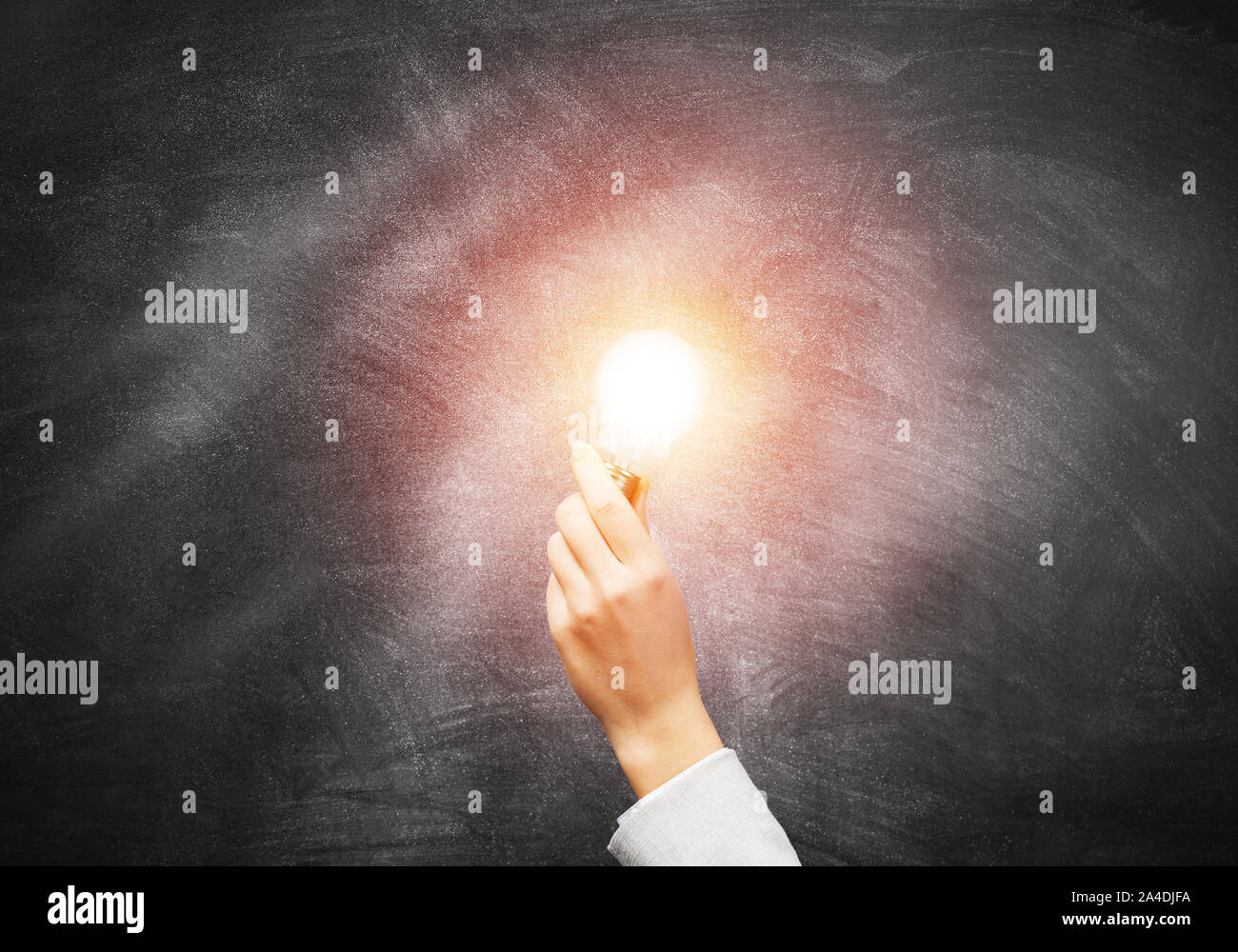 Human hand with glowing incandescent lamp Stock Photo - Alamy