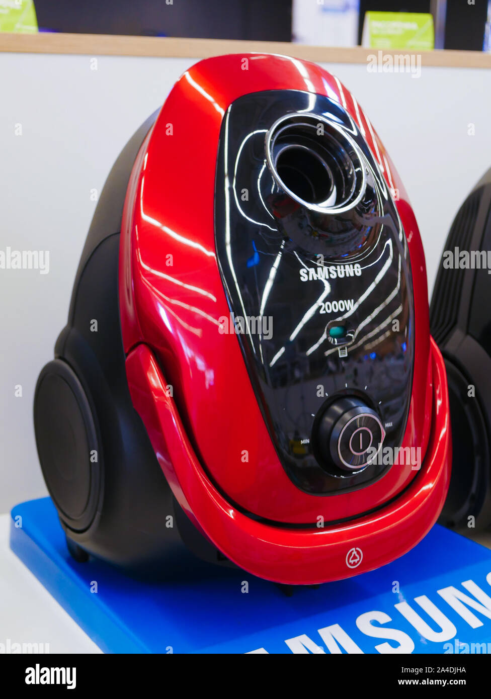 red vacuum cleaner. at the store counter. standing on a store shelf ...
