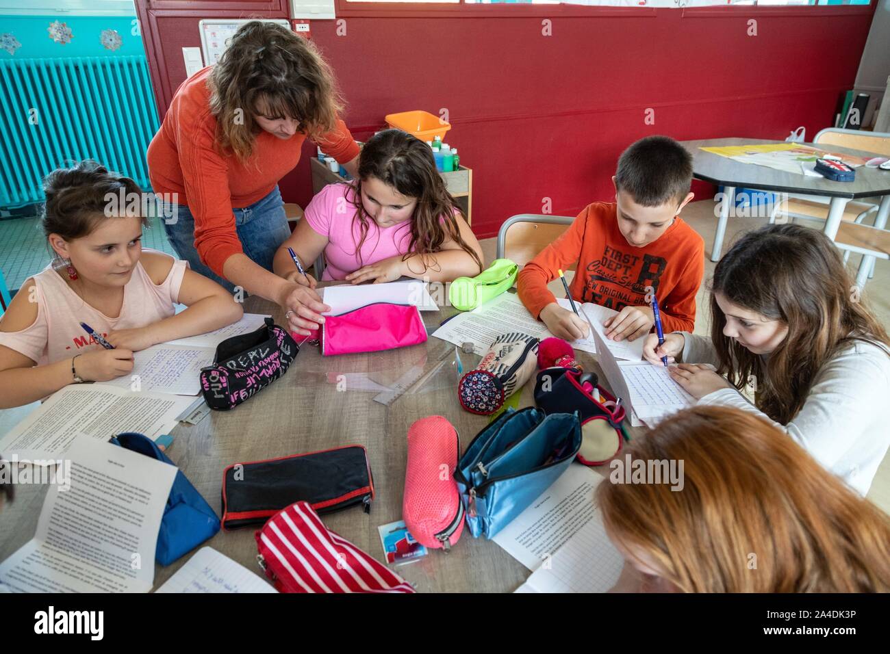 GROUP WORK IN THE CLASSROOM, A CLASS AT THE PRIMARY SCHOOL IN THE TOWN ...