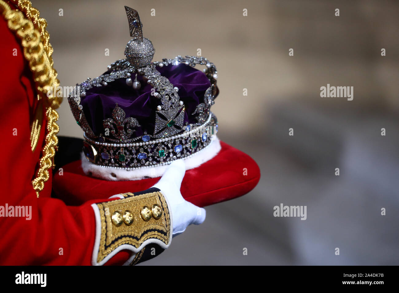 The Imperial State Crown is carried through the Sovereign's entrance ...