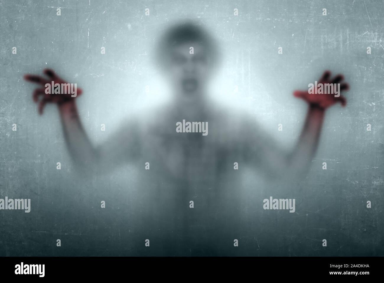 Scary zombies with blood standing behind of window glass with dark ...