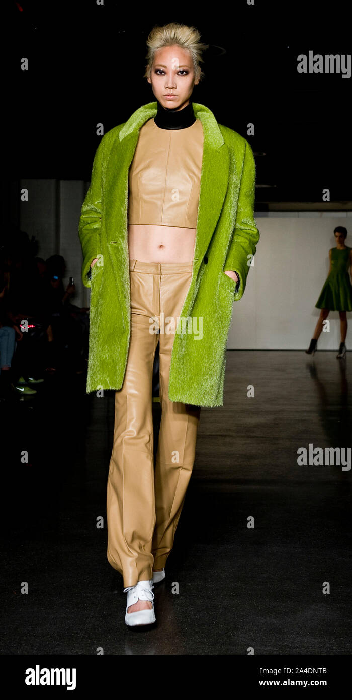 Fashion model catwalk brown leather coat hi-res stock photography and ...