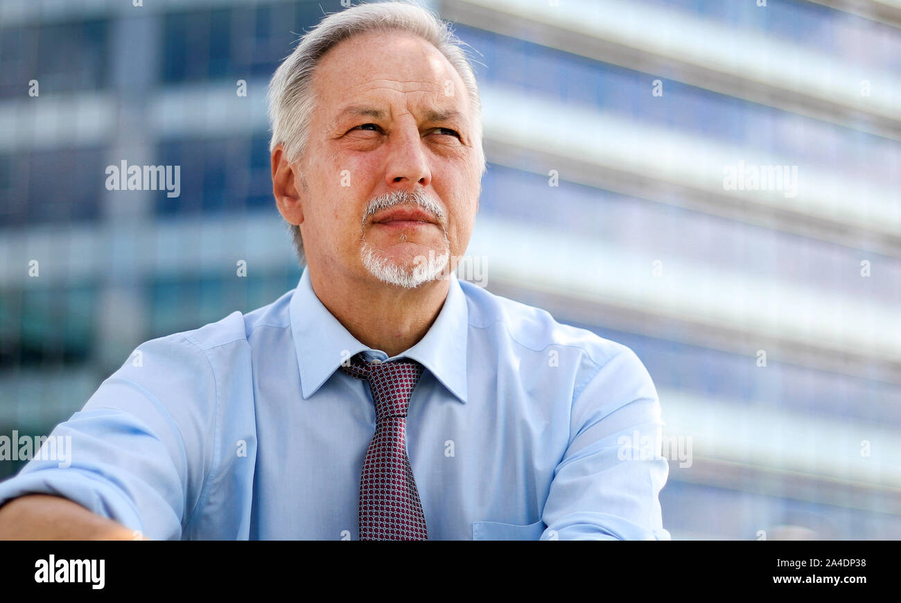 Outdoor pensive old businessman thinking hi-res stock photography and ...