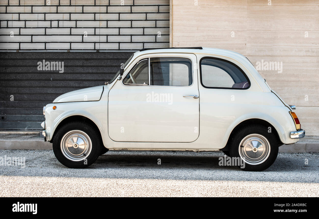 Small italian vintage car. White car Stock Photo - Alamy