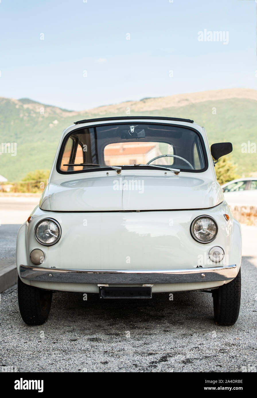 Small italian vintage car. White car Stock Photo - Alamy