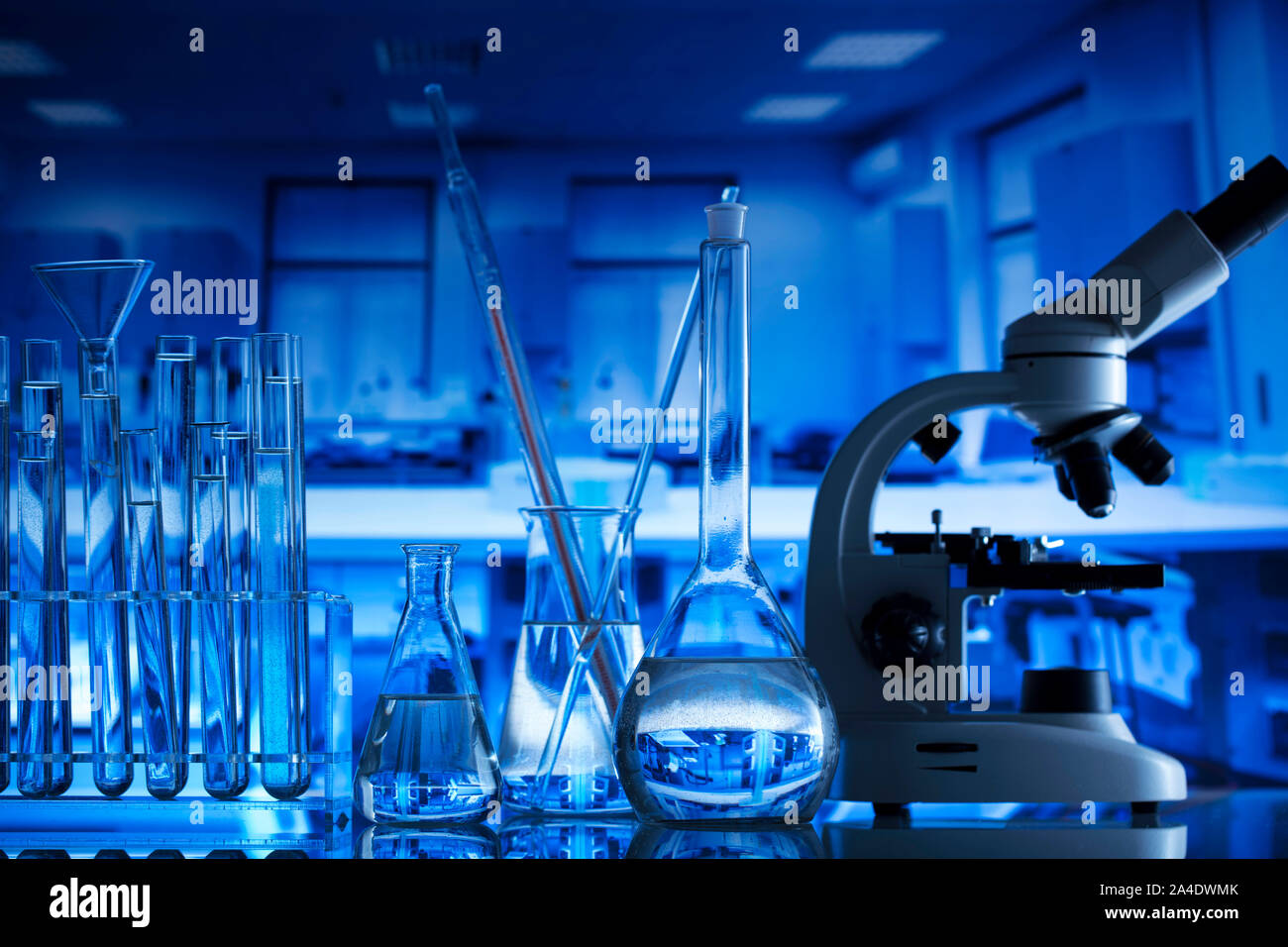 Science laboratory concept background. Microscope and laboratory ...