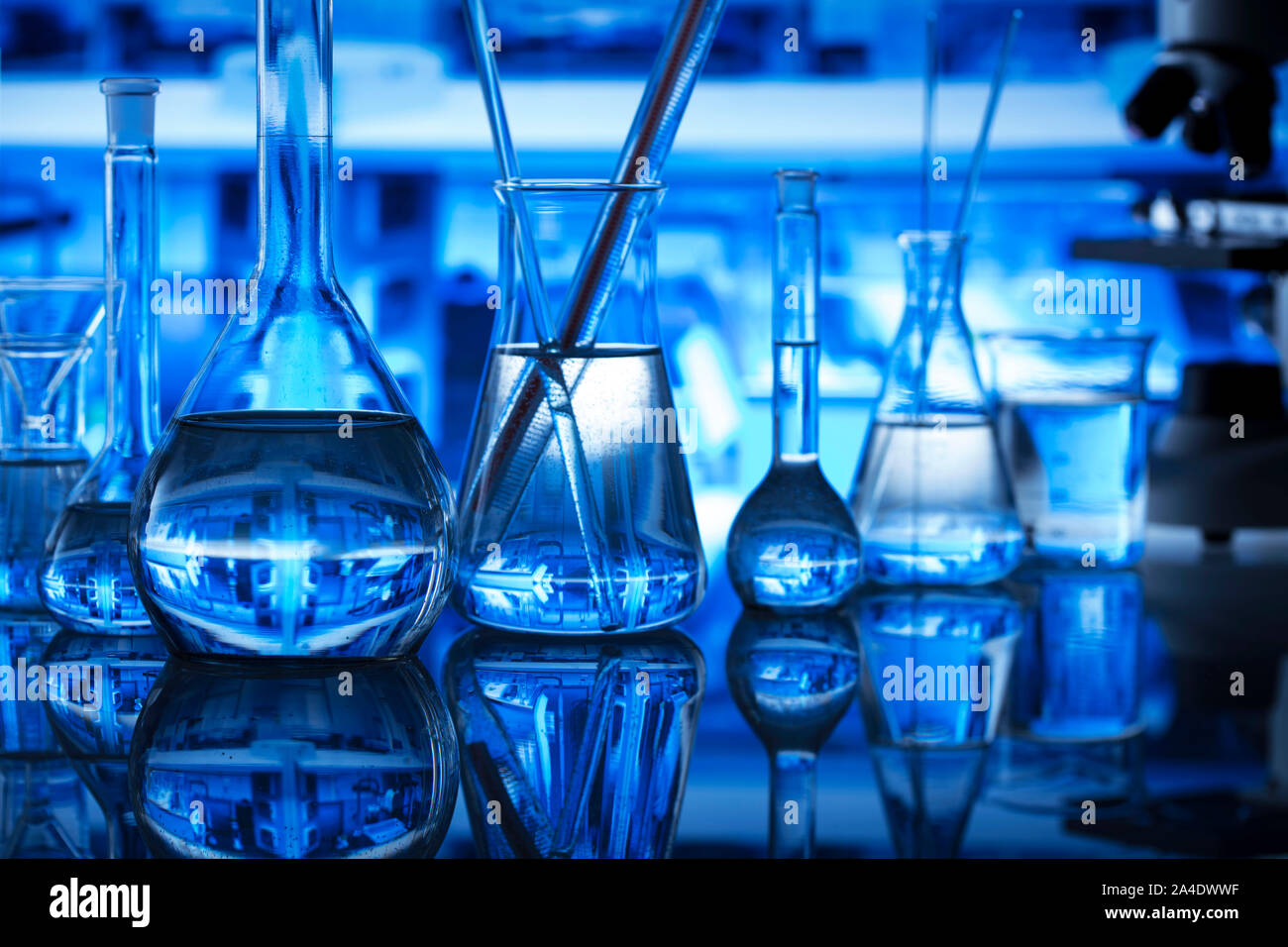 Science laboratory concept background. Microscope and laboratory ...