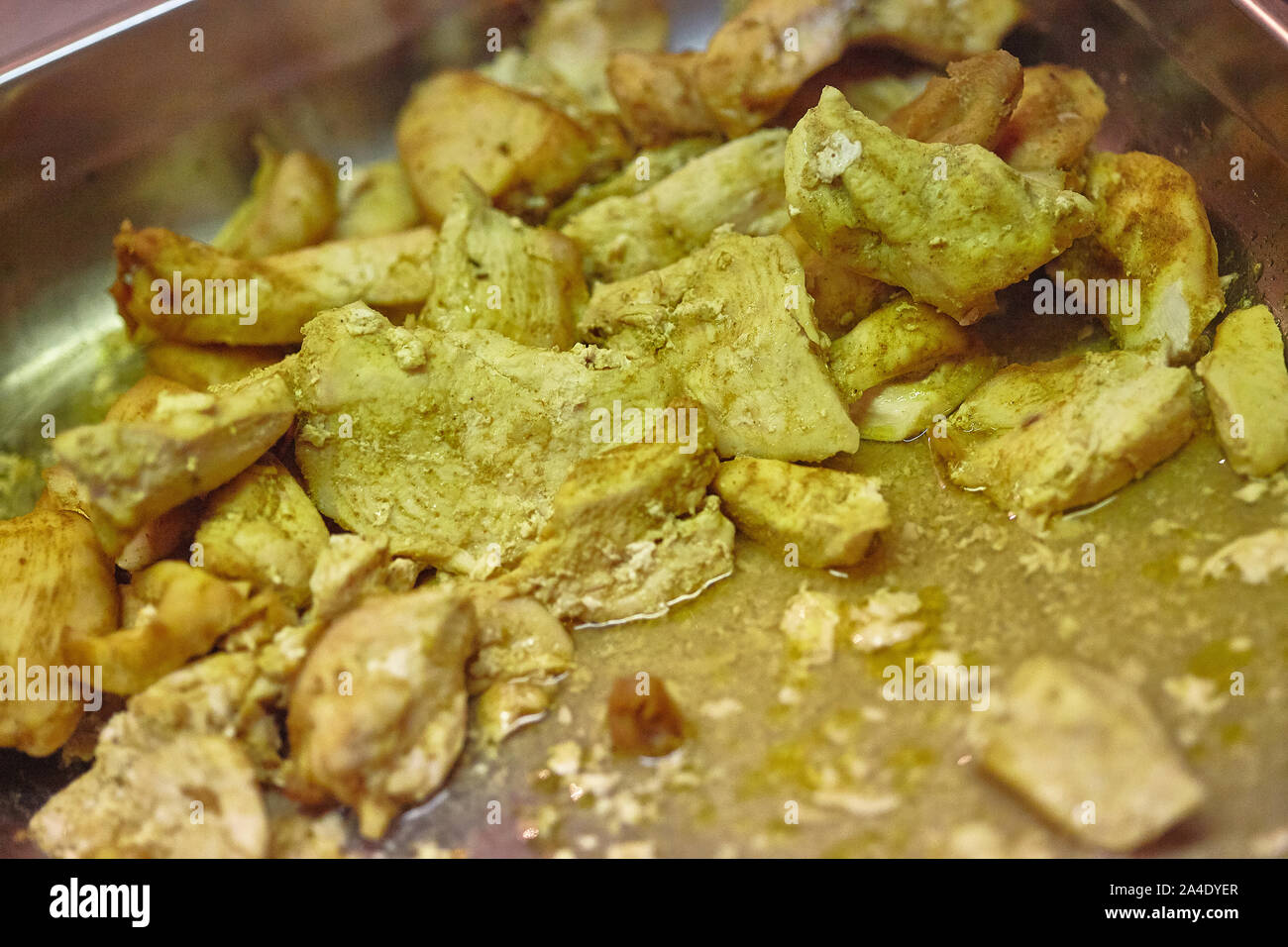 Chicken with curry in buffet Stock Photo - Alamy