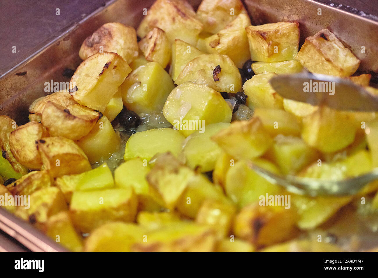 Baked potatoes in buffet Stock Photo - Alamy