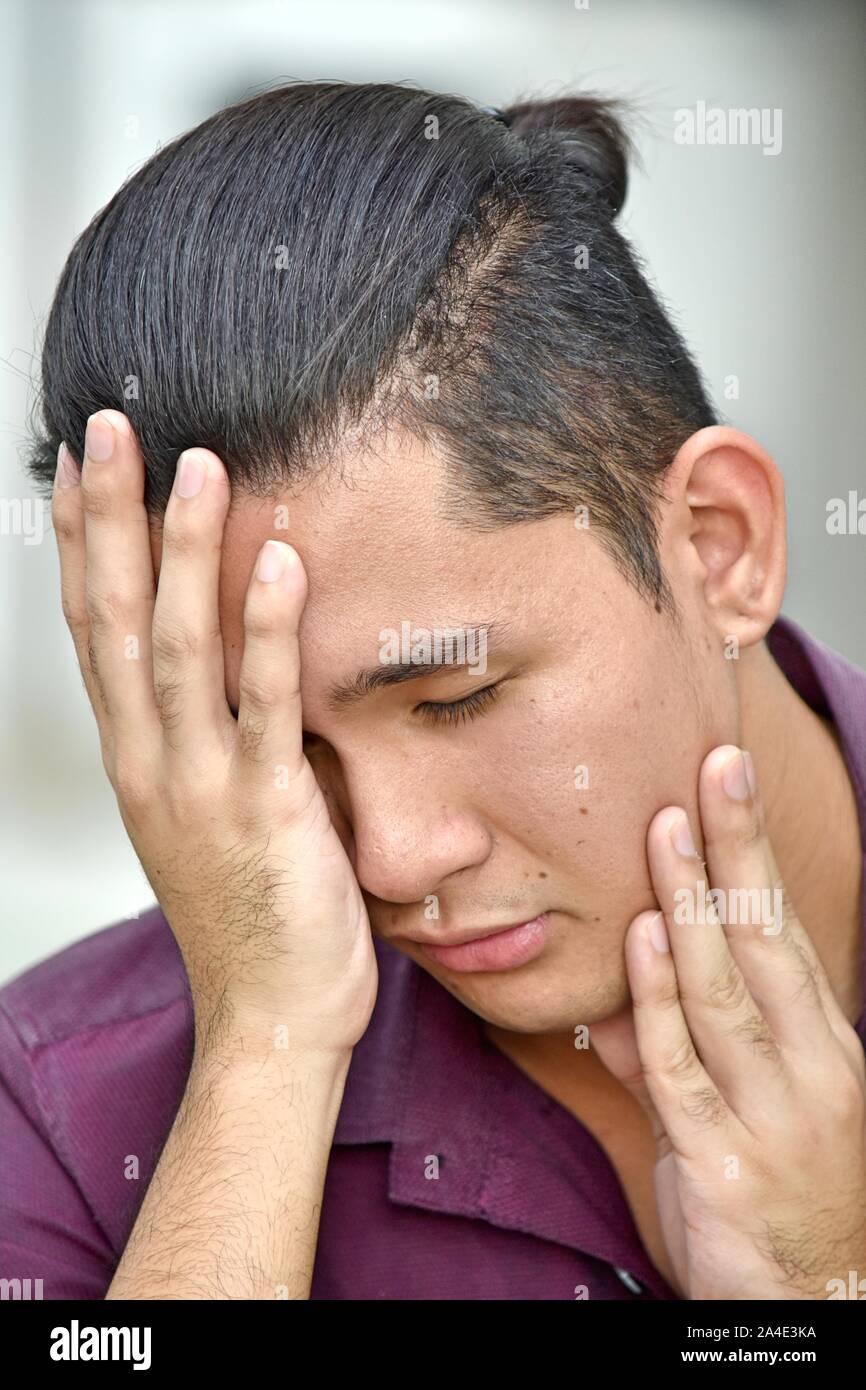 Depressed Filipino Person Stock Photo - Alamy