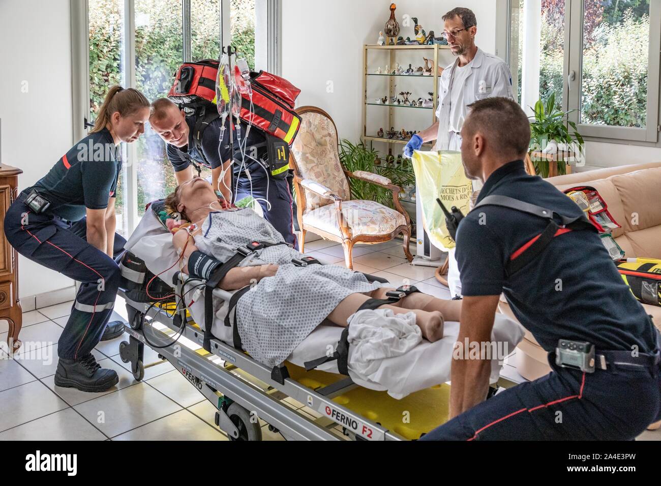 Fireman carrying woman hi-res stock photography and images - Alamy