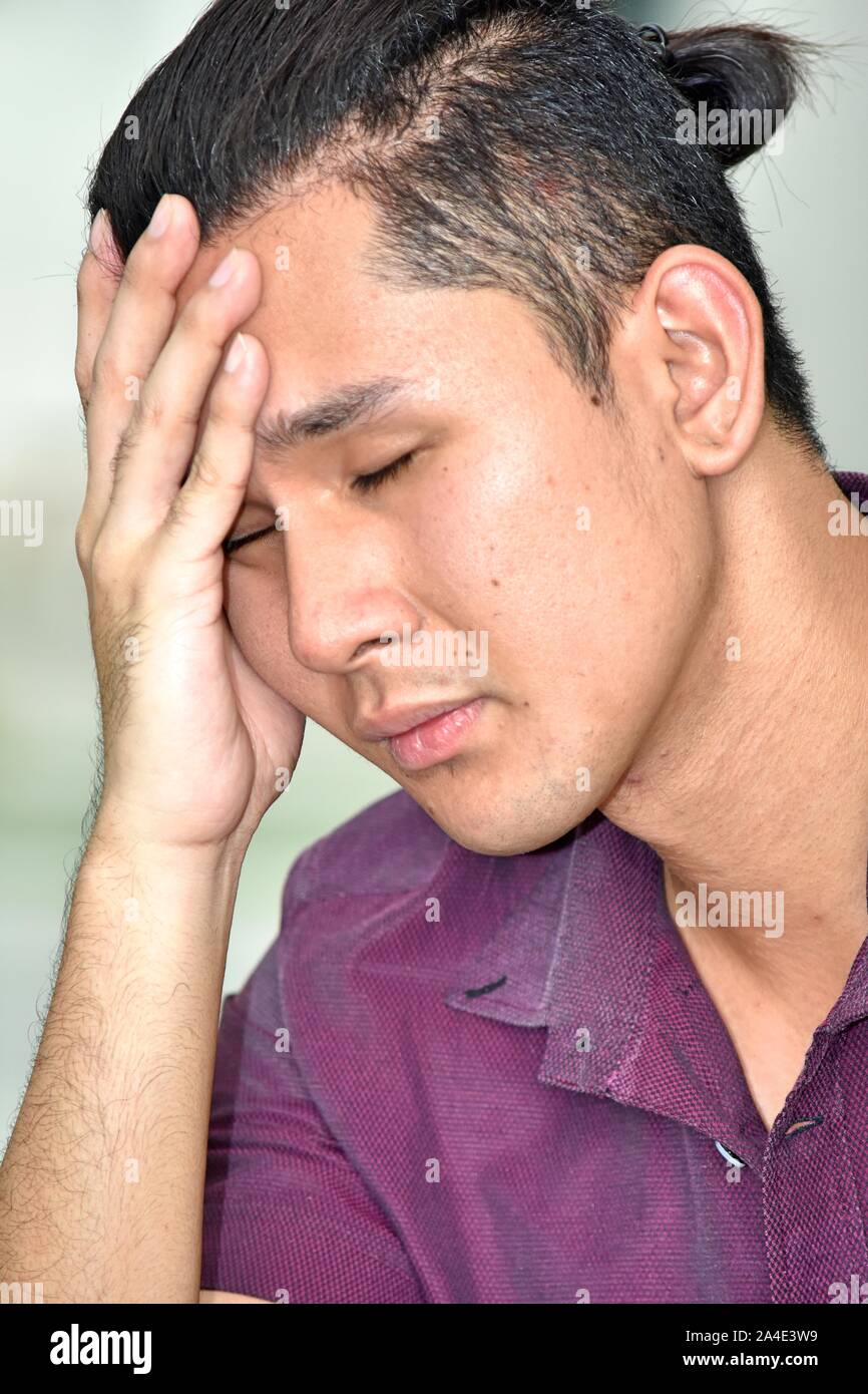 Sad Filipino Male Stock Photo - Alamy