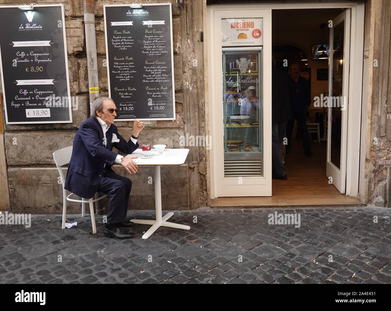 Man smoking cafe hi-res stock photography and images - Alamy
