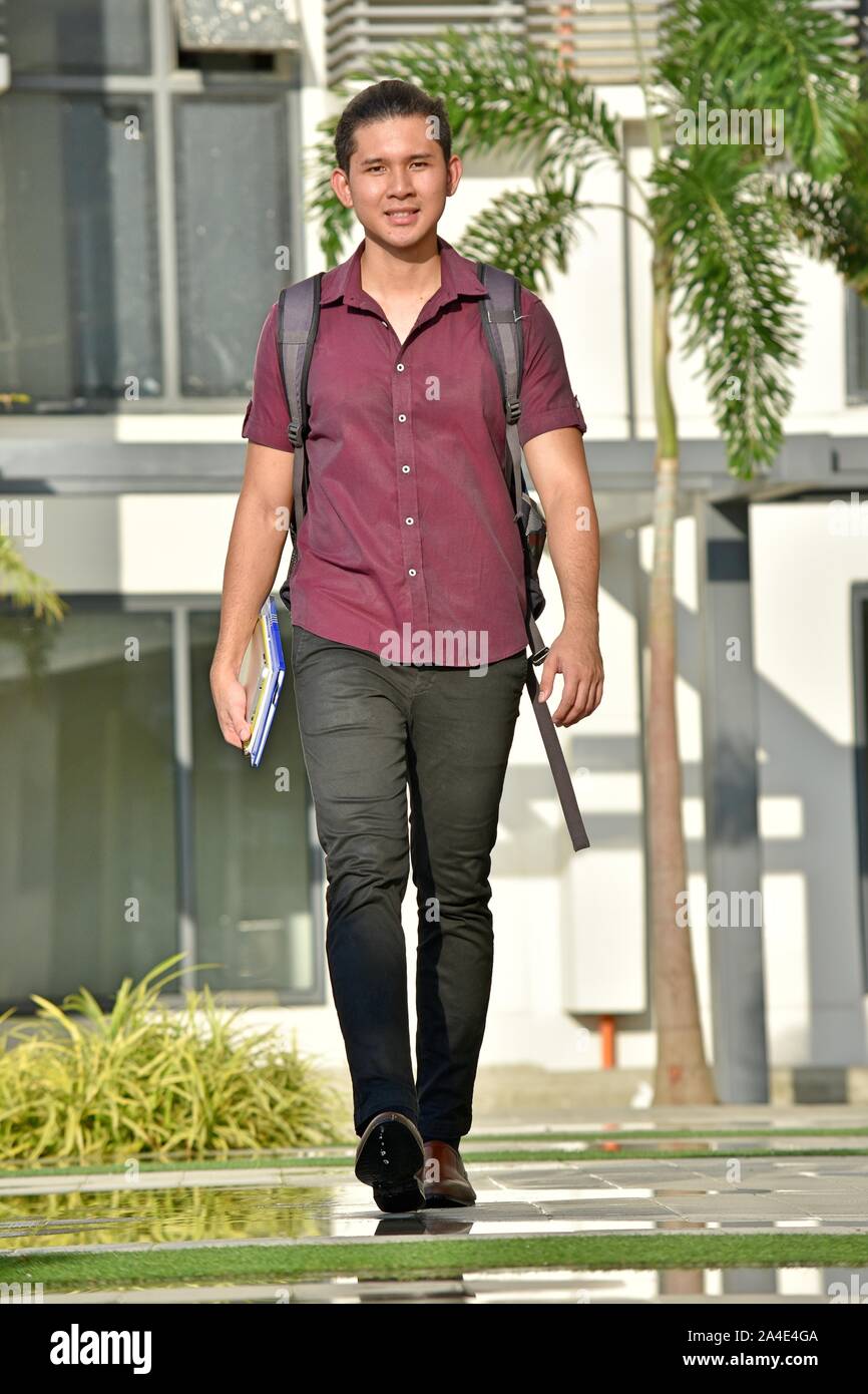 Handsome College Filipino Student Walking On Campus Stock Photo - Alamy