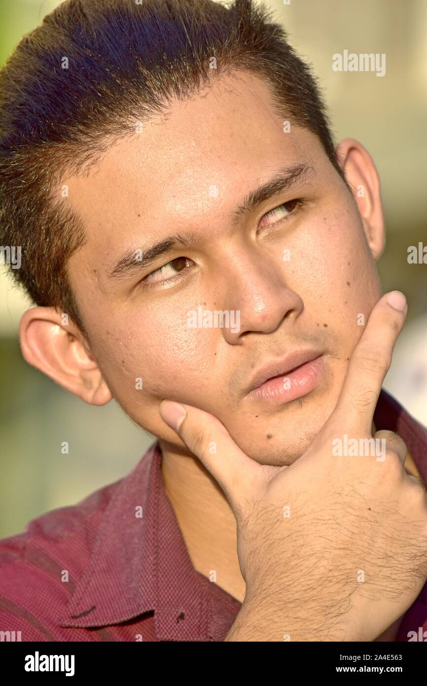 Young Adult Male Decision Making Stock Photo - Alamy